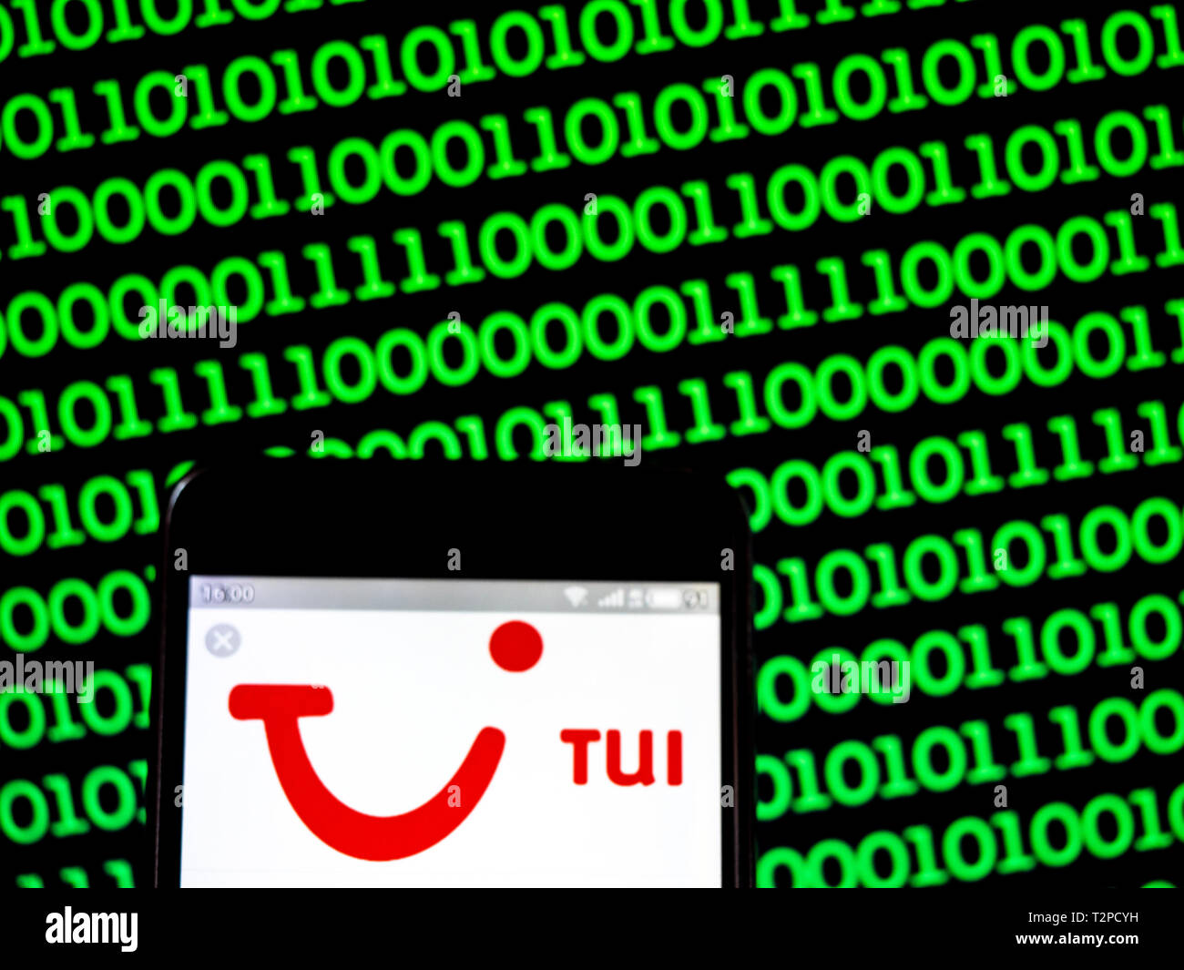 In this photo illustration a TUI Group logo seen displayed on a smart ...