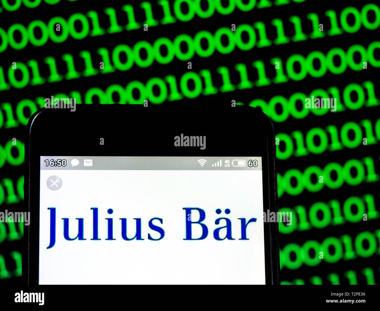 In this photo illustration a Julius Bar Group logo seen displayed on a ...