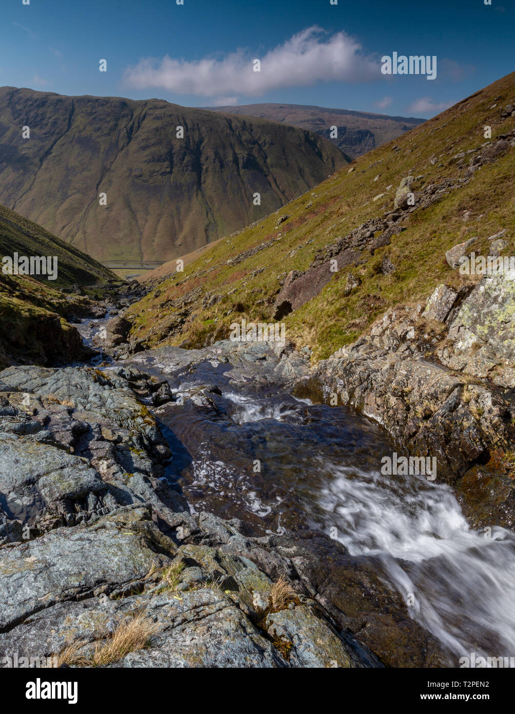 Raise Beck and waterfall, with views across to Steel Fell, Cumbria ...