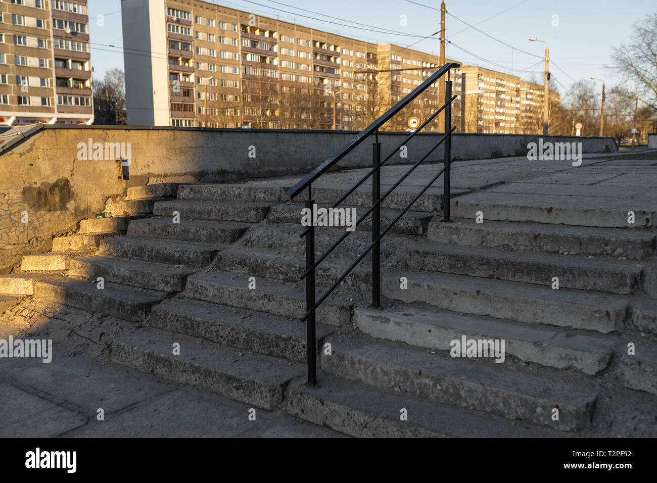 Old decayed stairs made of concrete in an old Soviet district in Riga ...