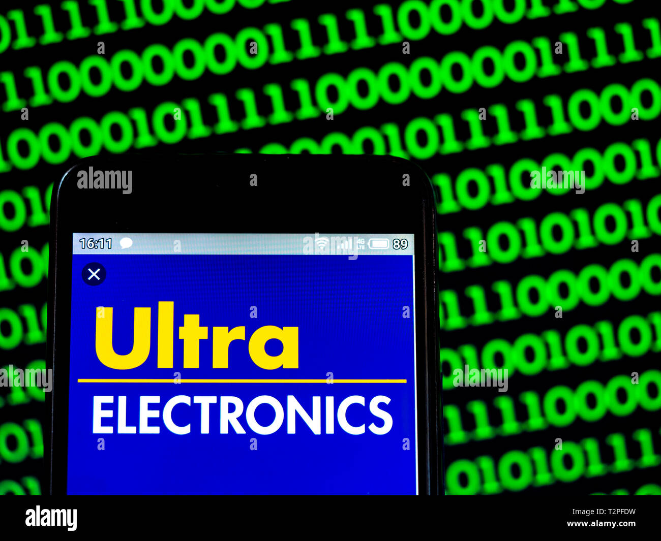 In this photo illustration a Ultra Electronics Holdings logo seen ...