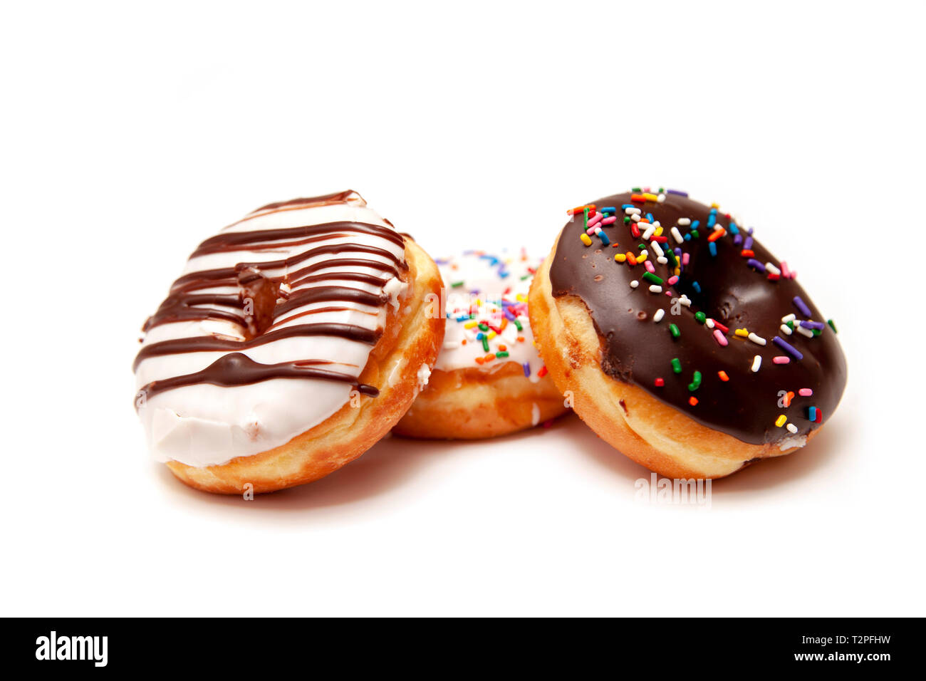 chocolate, caramel and mixed donuts with colorful sparkle Stock Photo ...