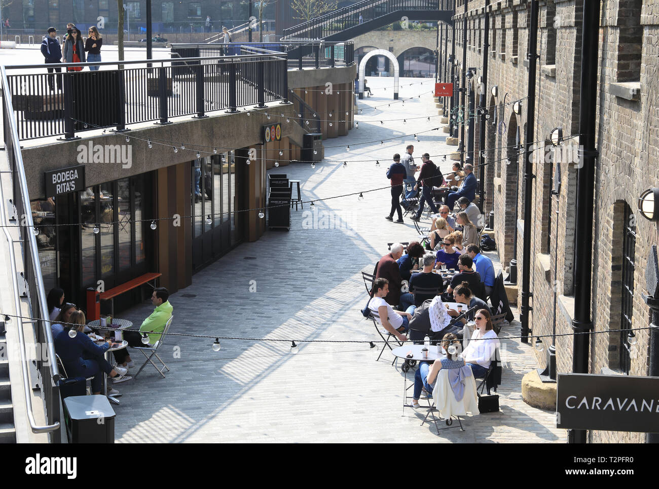 Cafes and shops on trendy Lower Stable Street at Coal Drops Yard, at ...