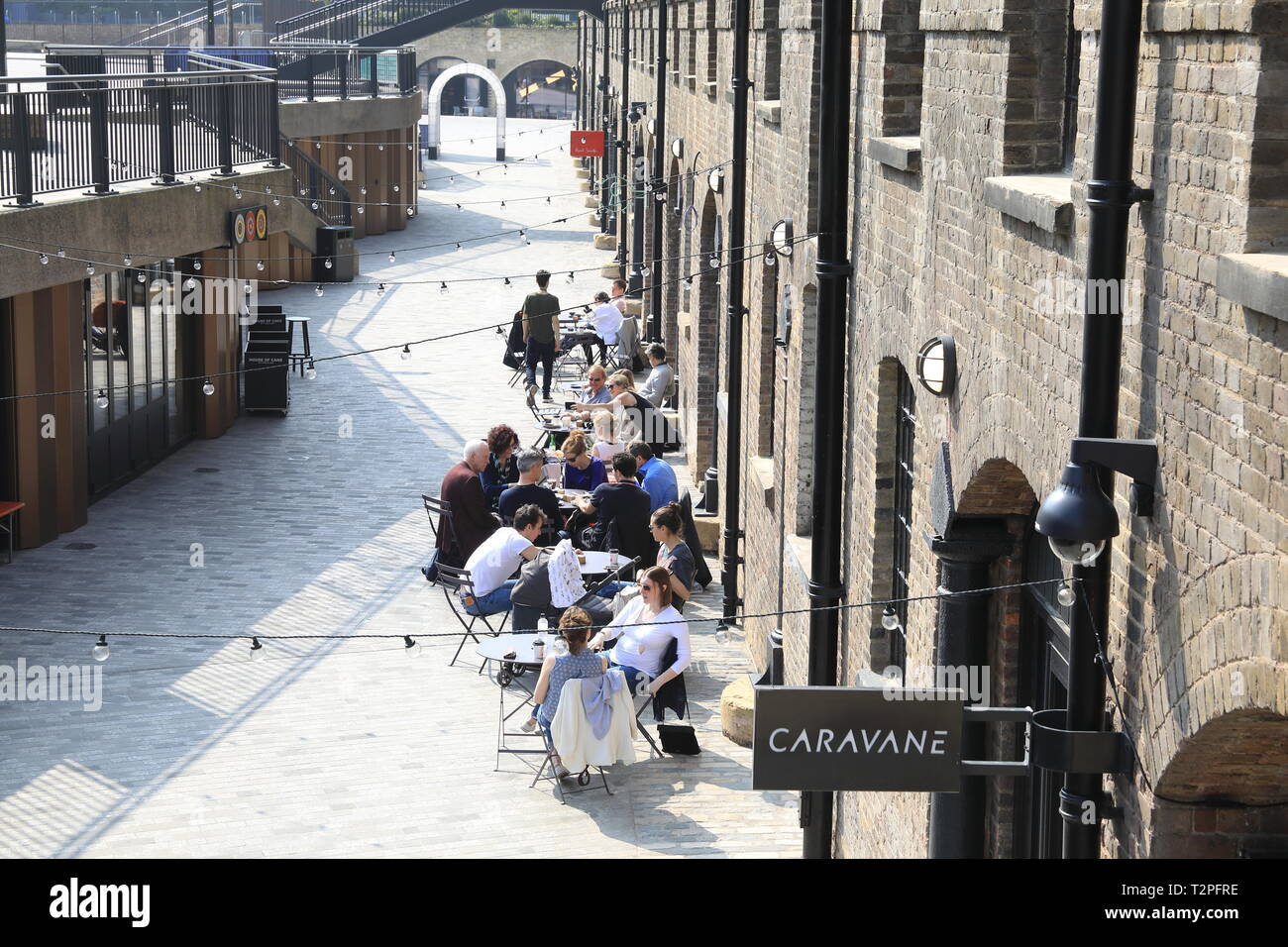 Cafes and shops on trendy Lower Stable Street at Coal Drops Yard, at ...