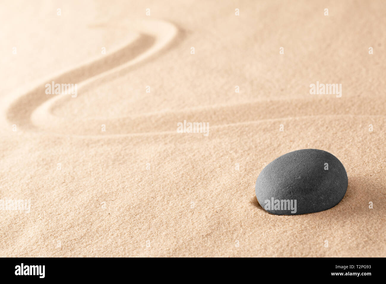 black zen meditation stone in Japanese sand garden. Concept for harmony ...