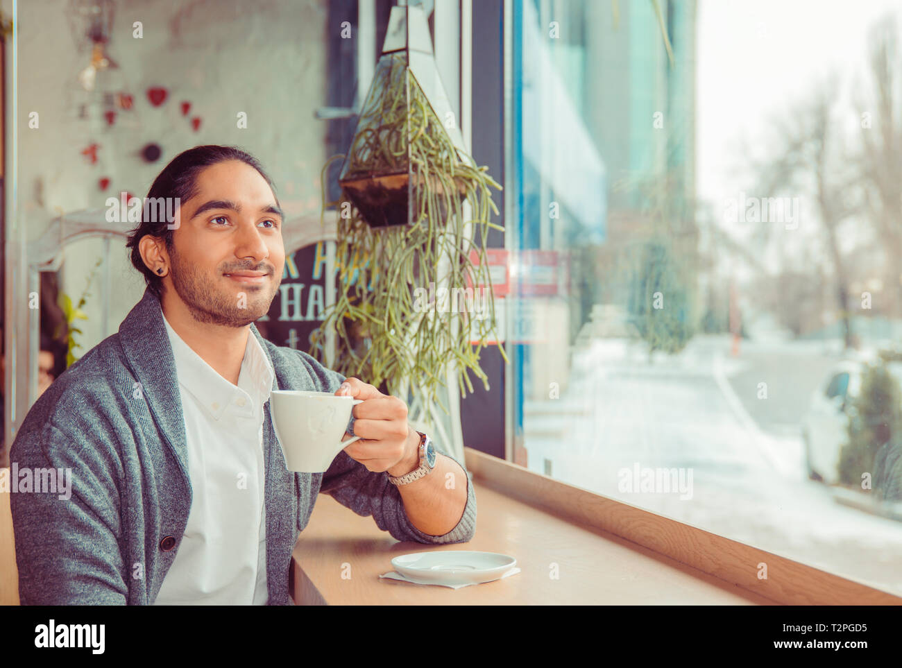 Boy looking at shop window hi-res stock photography and images - Alamy