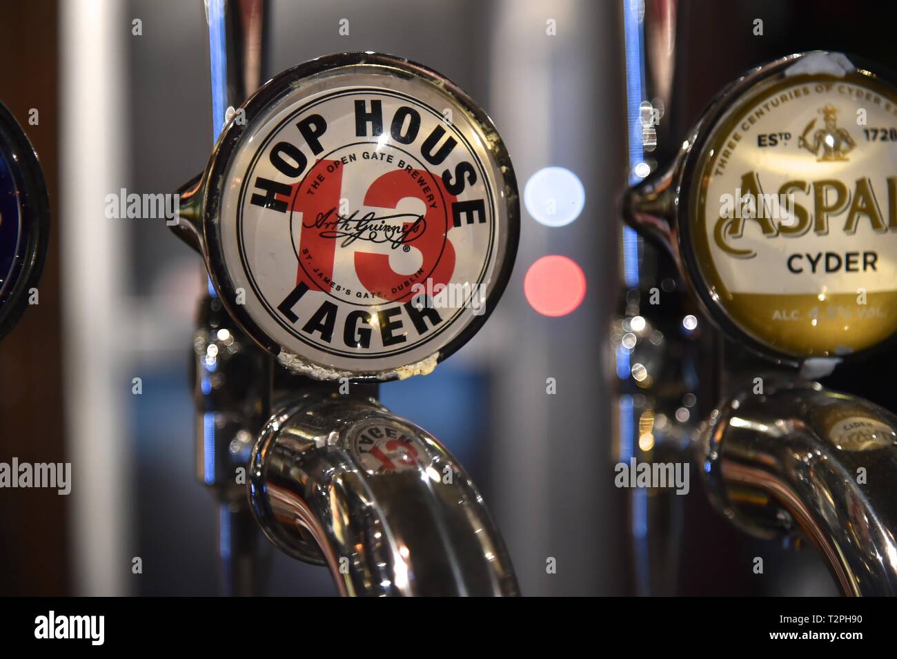 Alcoholic drinks displayed in a pub or bar Stock Photo - Alamy