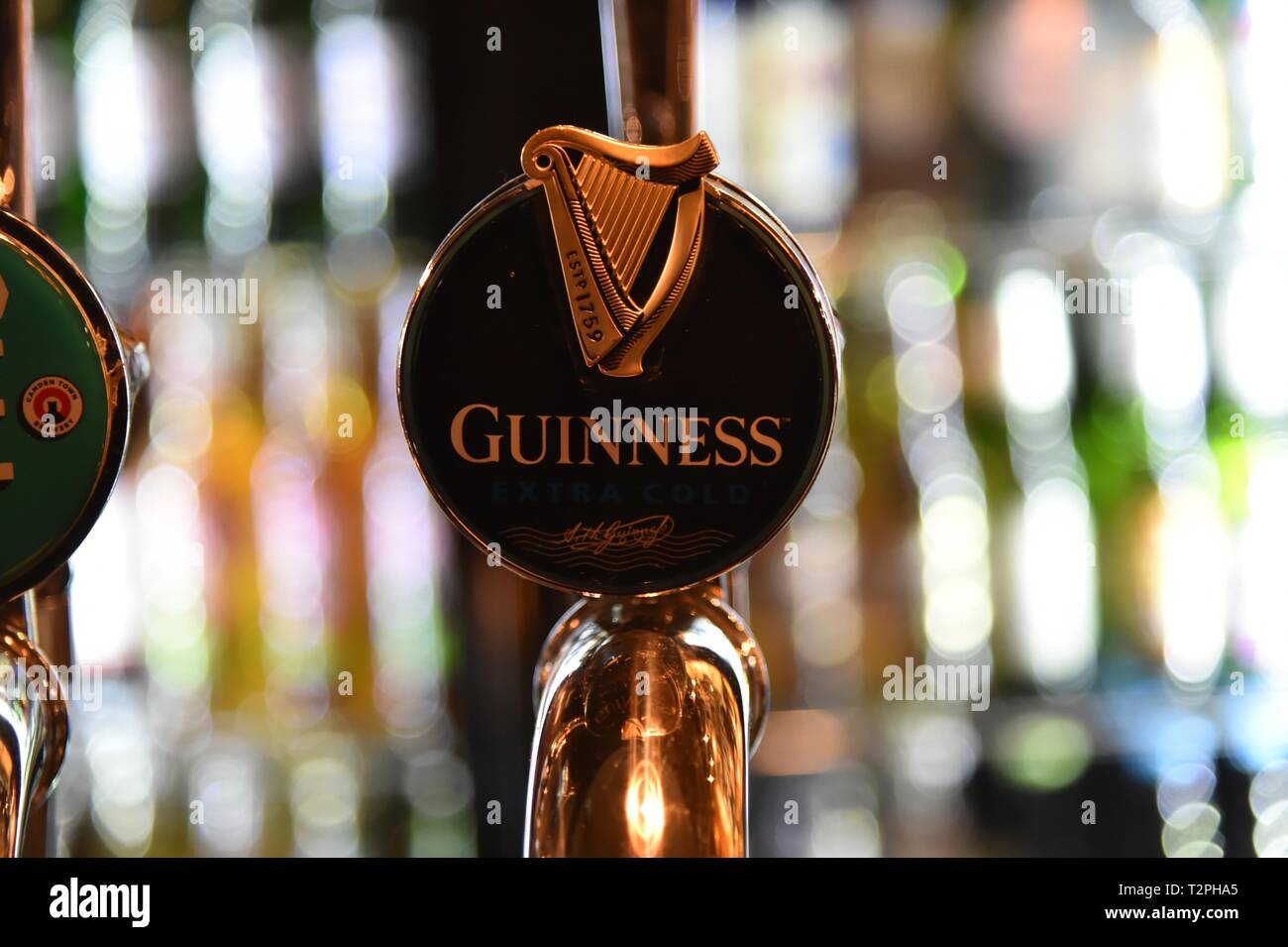 Alcoholic drinks displayed in a pub or bar Stock Photo - Alamy
