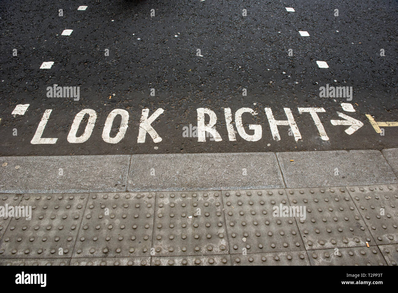 Pedestrian crossing look left sign hi-res stock photography and images ...
