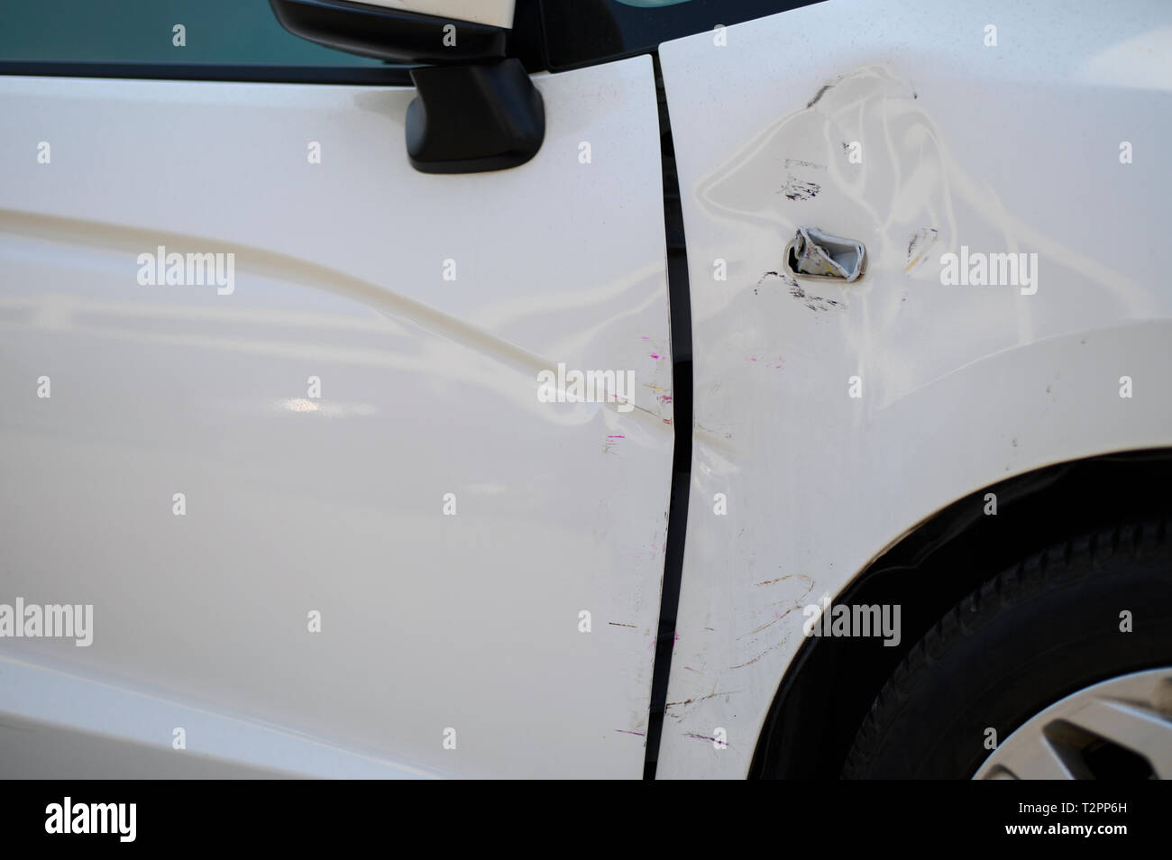 Side cars with dents from the accident Stock Photo - Alamy