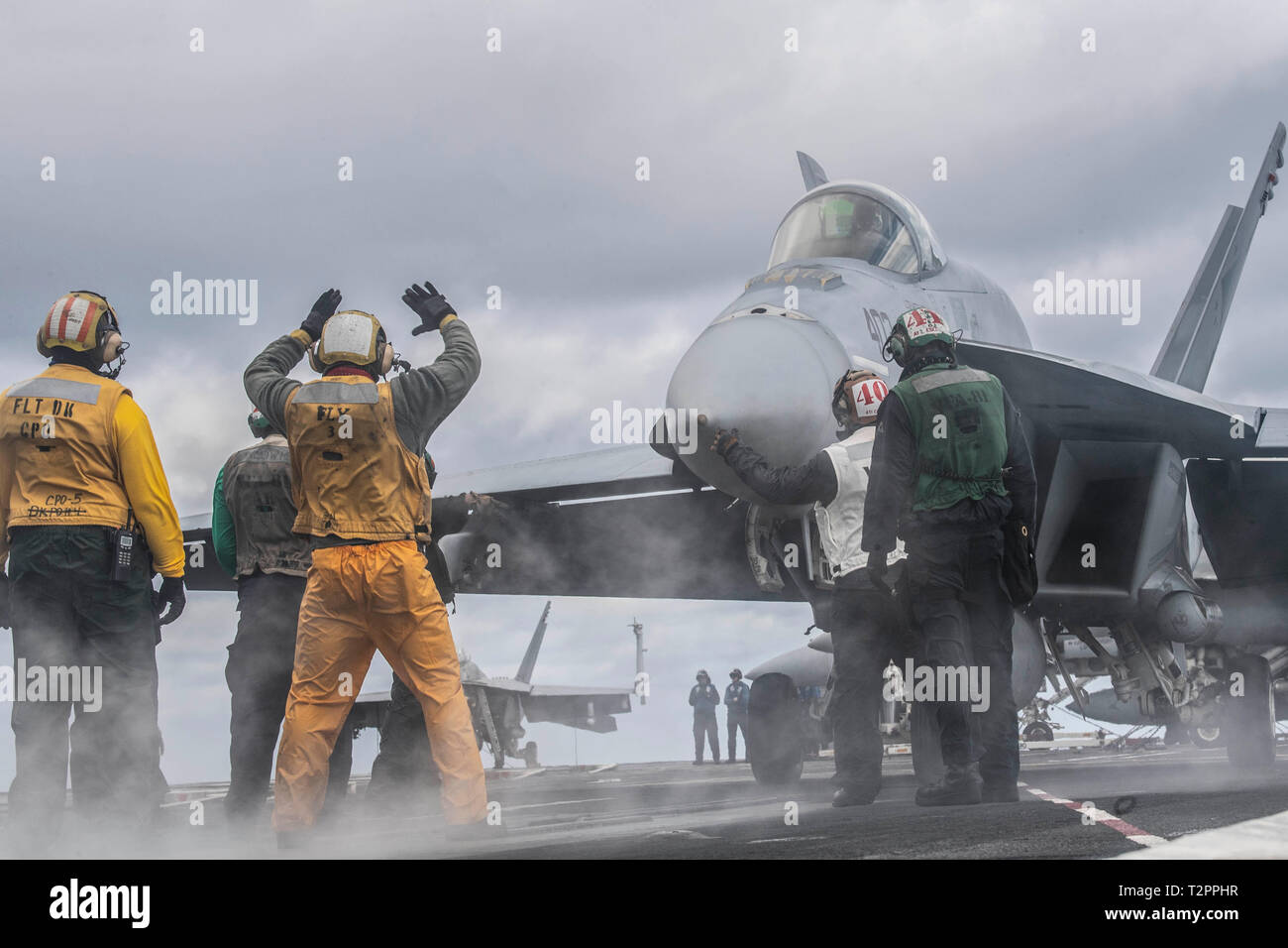 190402-N-IG466-0061 ATLANTIC OCEAN (April 2, 2019) Sailors direct an F ...