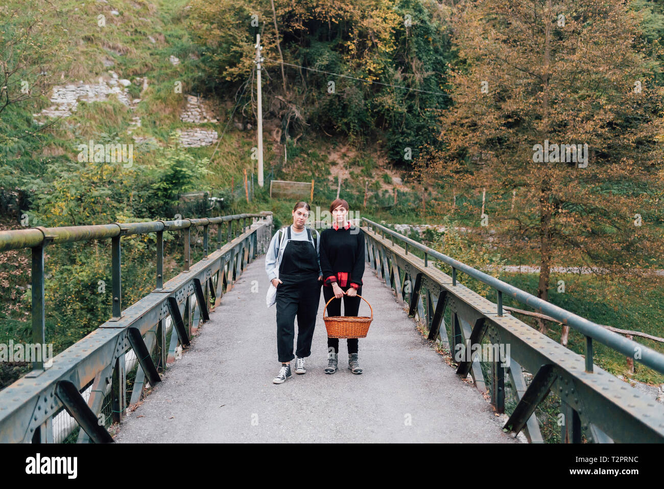 Women on bridge hi-res stock photography and images - Alamy