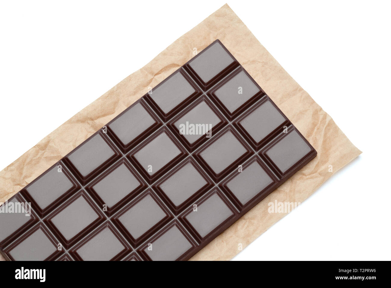 dark chocolate bar on craft packaging paper isolated on white ...