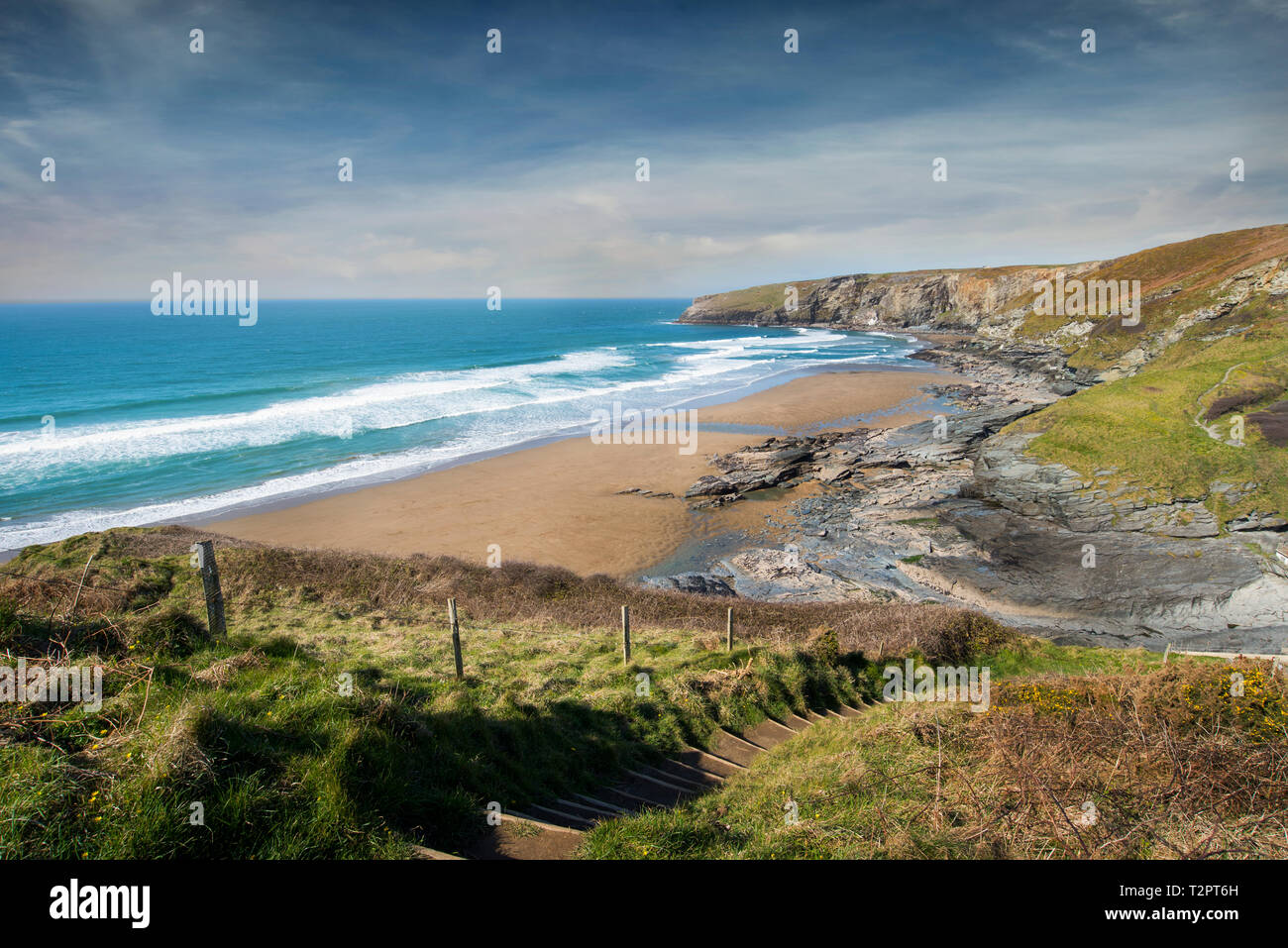 The vast expanse of the golden sands at Trebarwith Strand with the ...