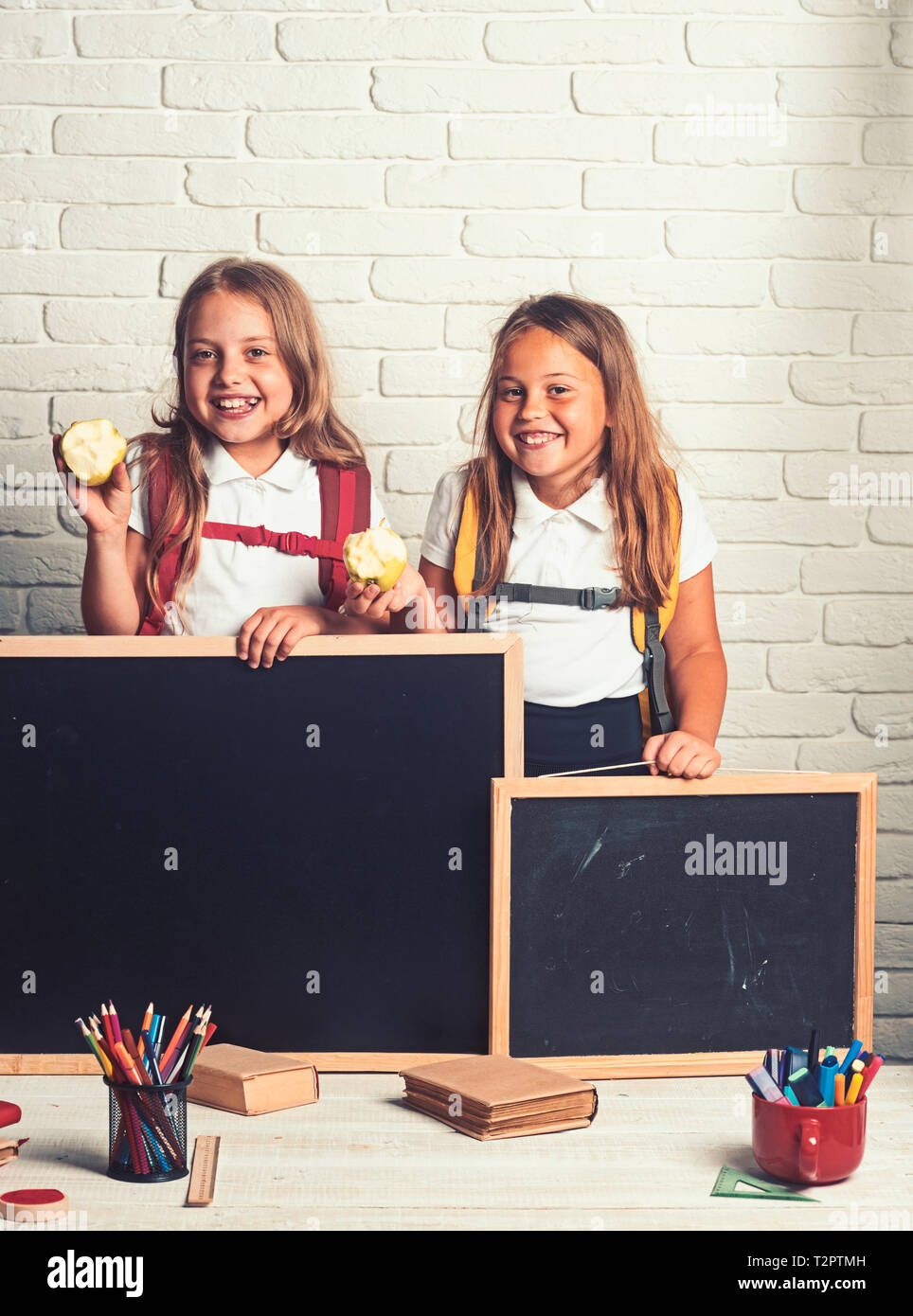 blackboard in hands of happy little kids. blackboard for copy space at ...