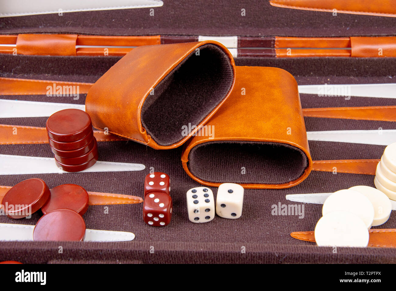 backgammon game with dice and dice cup Stock Photo - Alamy
