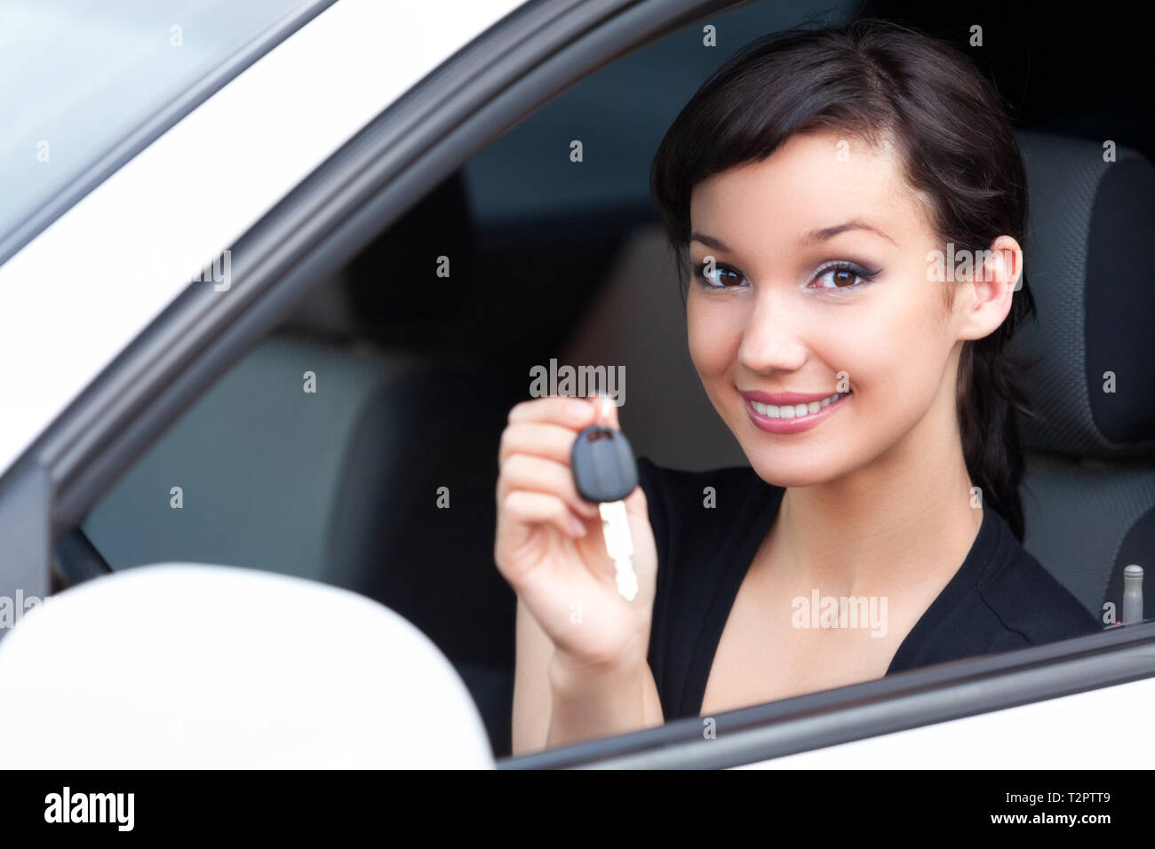 Young happy woman driver hold car keys in her new car Stock Photo - Alamy