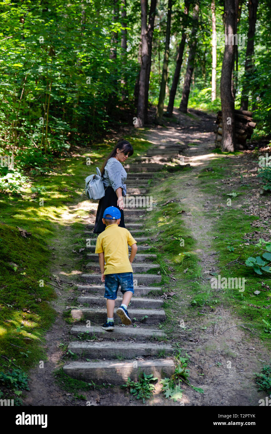Boy running up stairs hi-res stock photography and images - Alamy