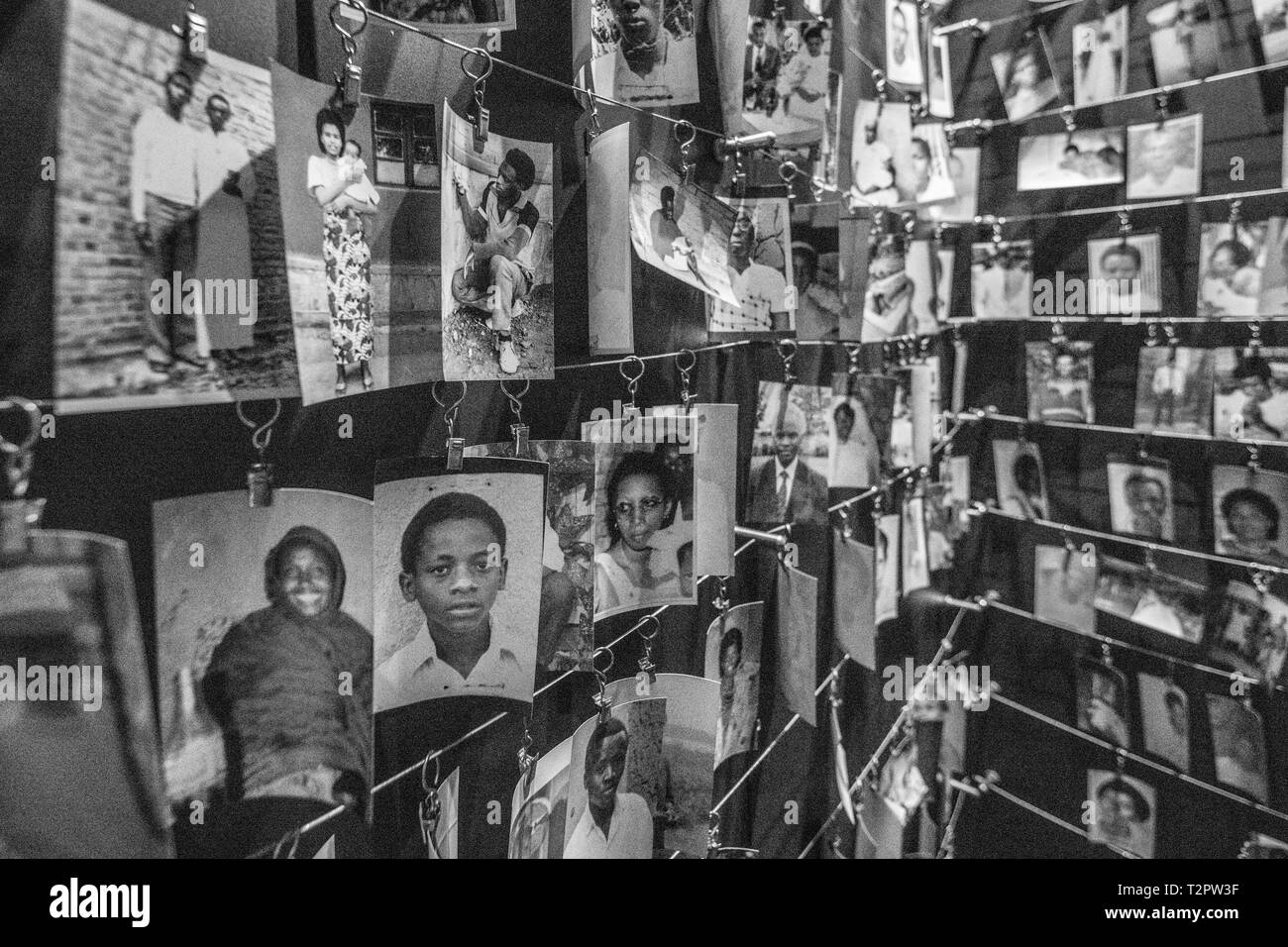 Photographs of known victims of the 1994 Rwandan Genocide line the ...