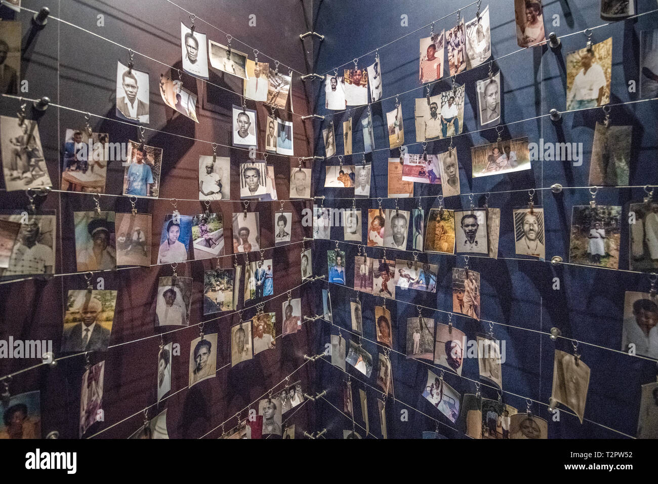 Photographs of known victims of the 1994 Rwandan Genocide line the ...