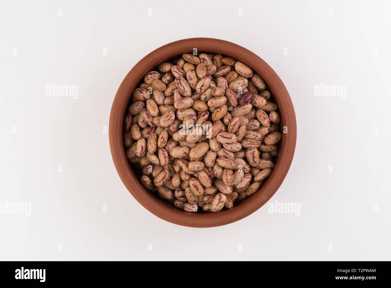 A plate of beans on white background Stock Photo - Alamy