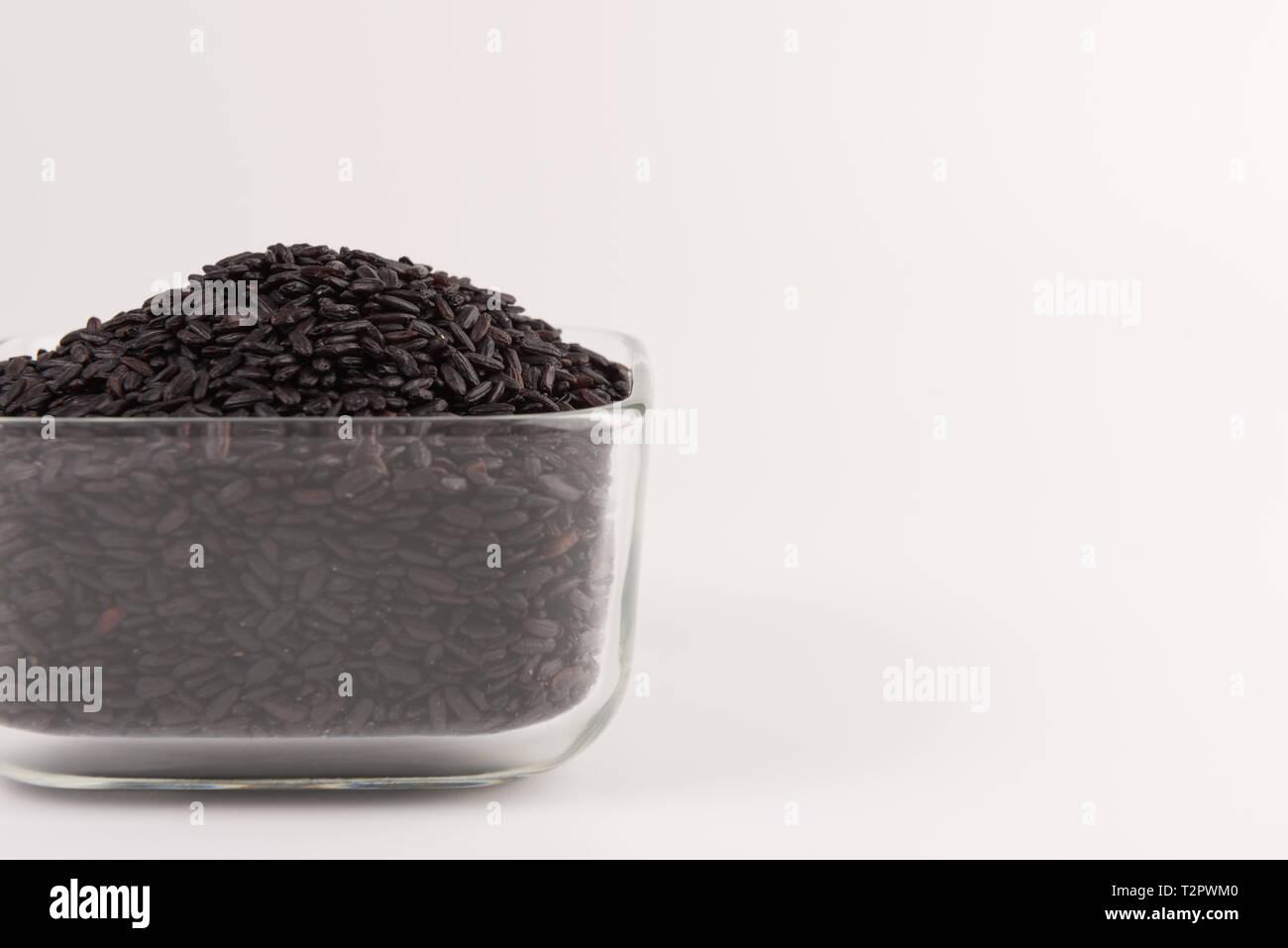bowl of black wild rice isolated on white background Stock Photo - Alamy