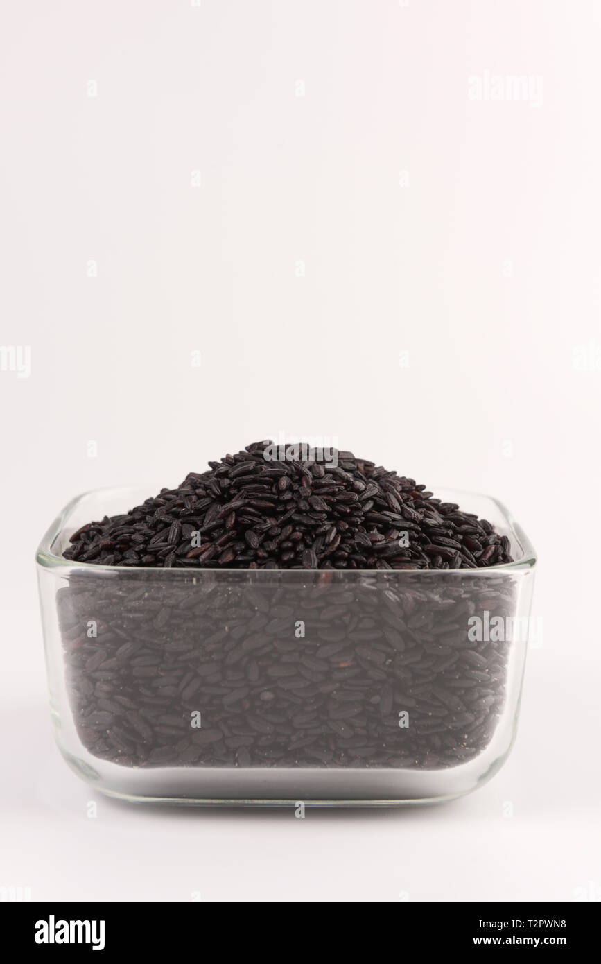 bowl of black wild rice isolated on white background Stock Photo - Alamy