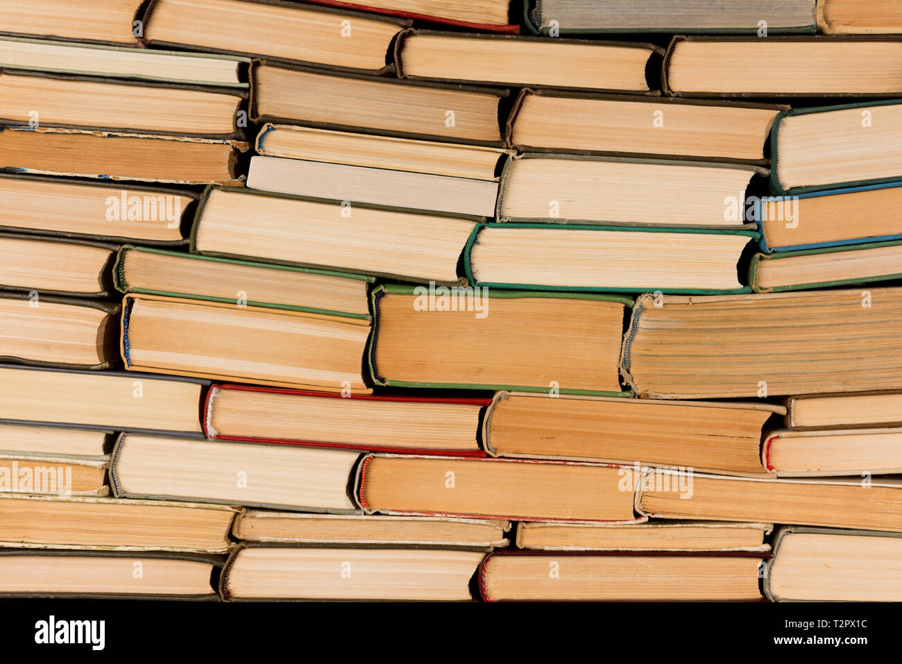 Stack of books background. many books piles Stock Photo - Alamy