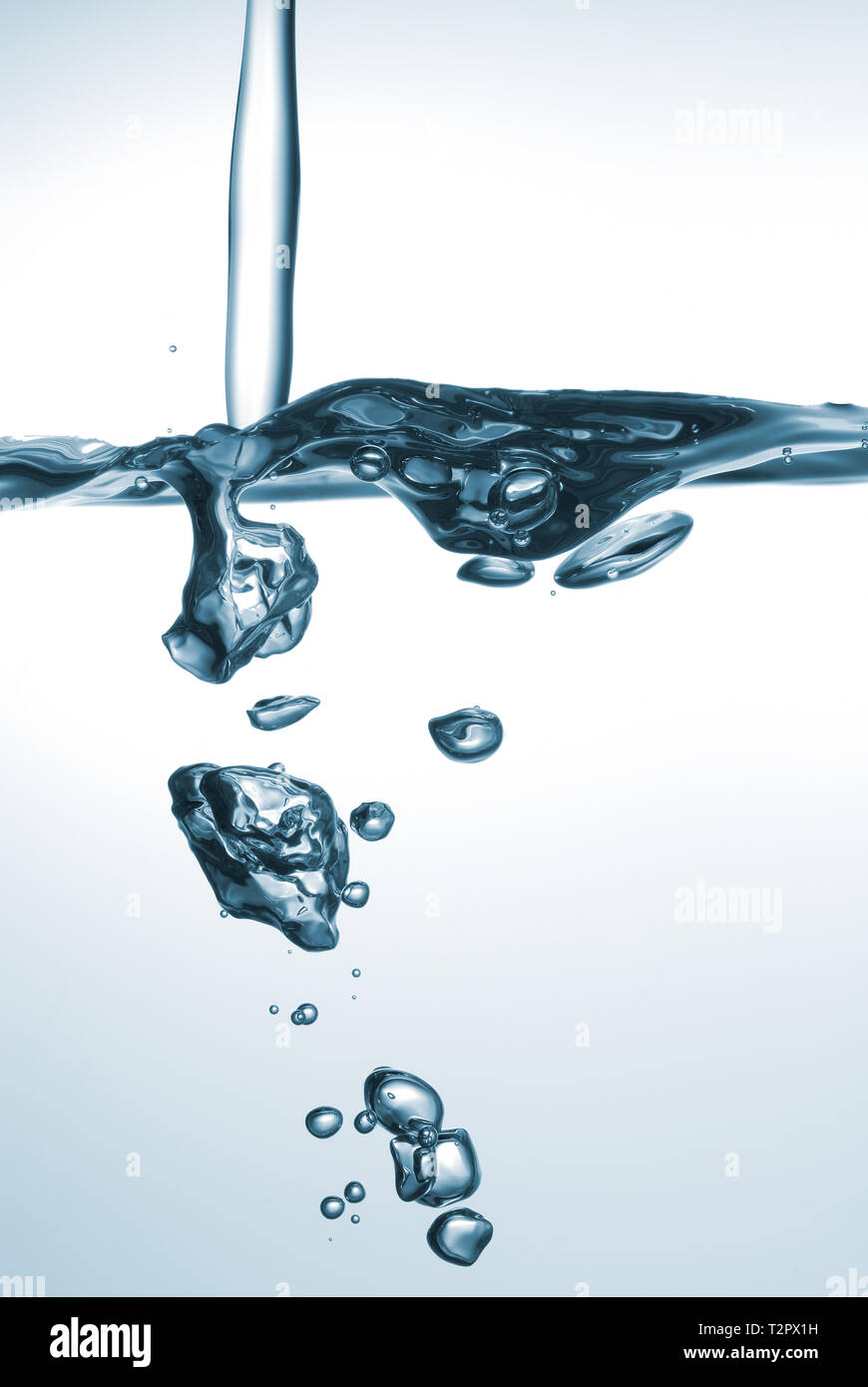 Water splash. Fizzy liquid with bubbles poured into glass vessel Stock ...