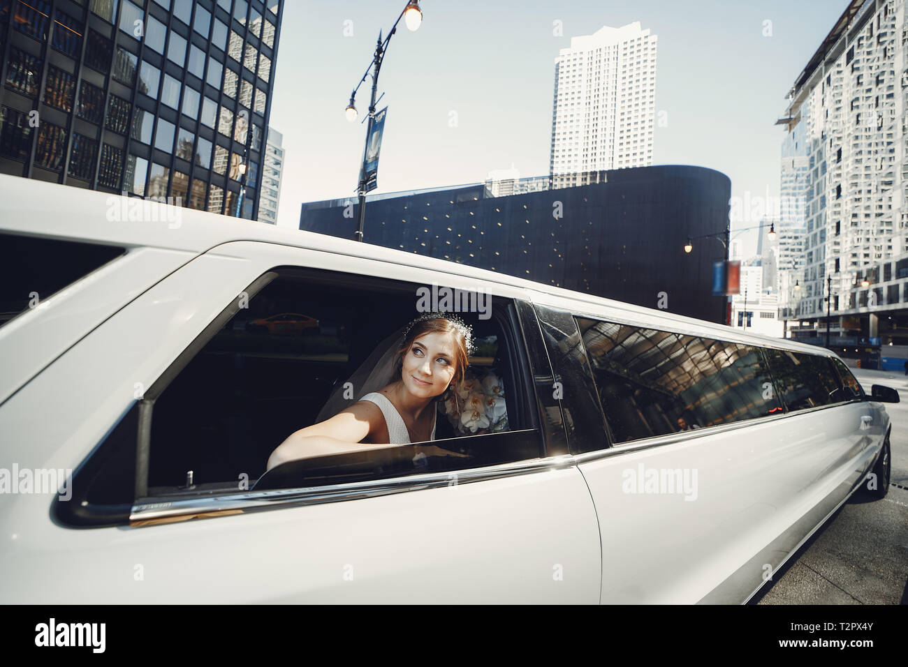 Beautiful girl sitting big bouquet hi-res stock photography and images ...