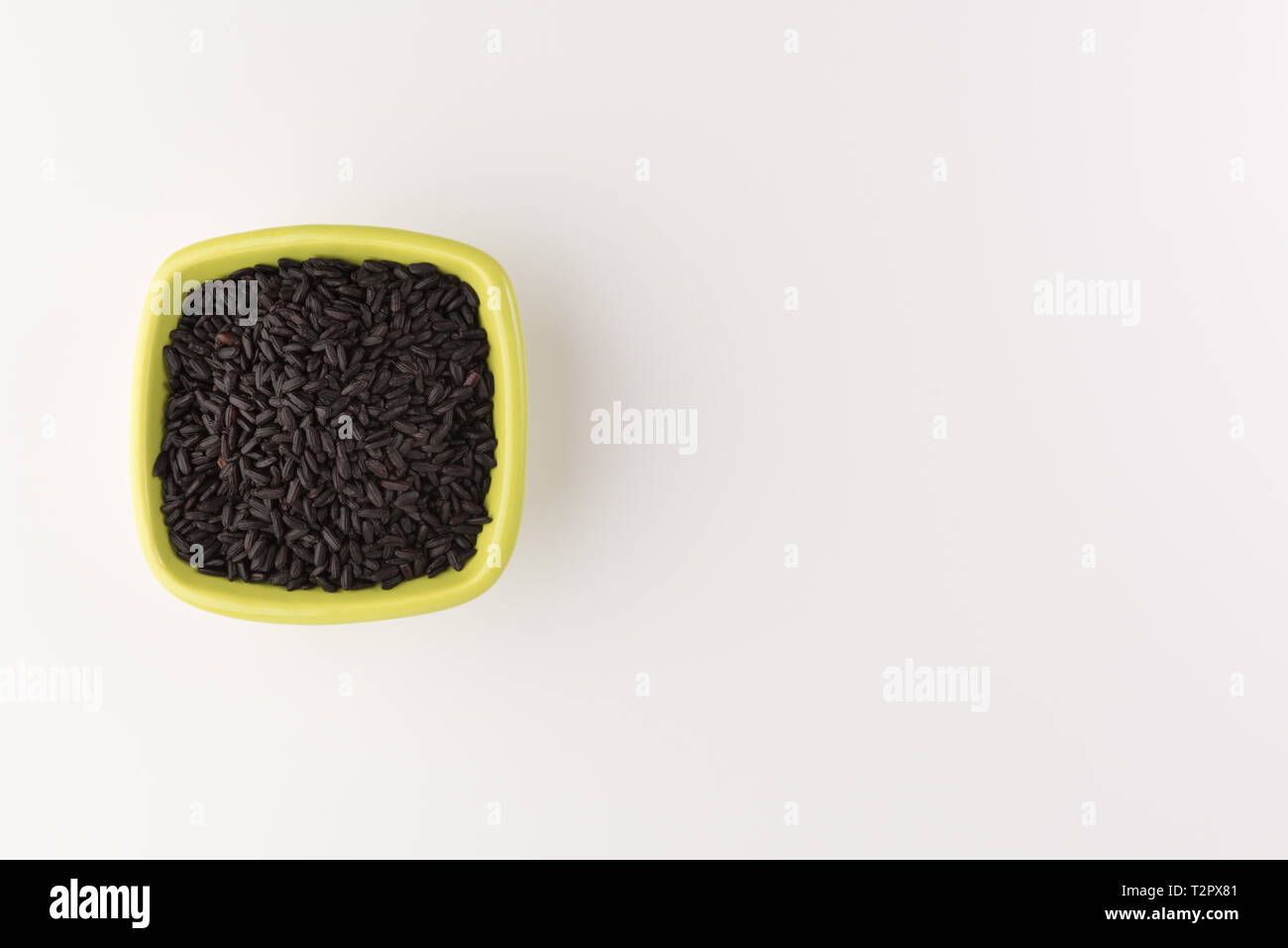 bowl of black wild rice isolated on white background, top view Stock ...