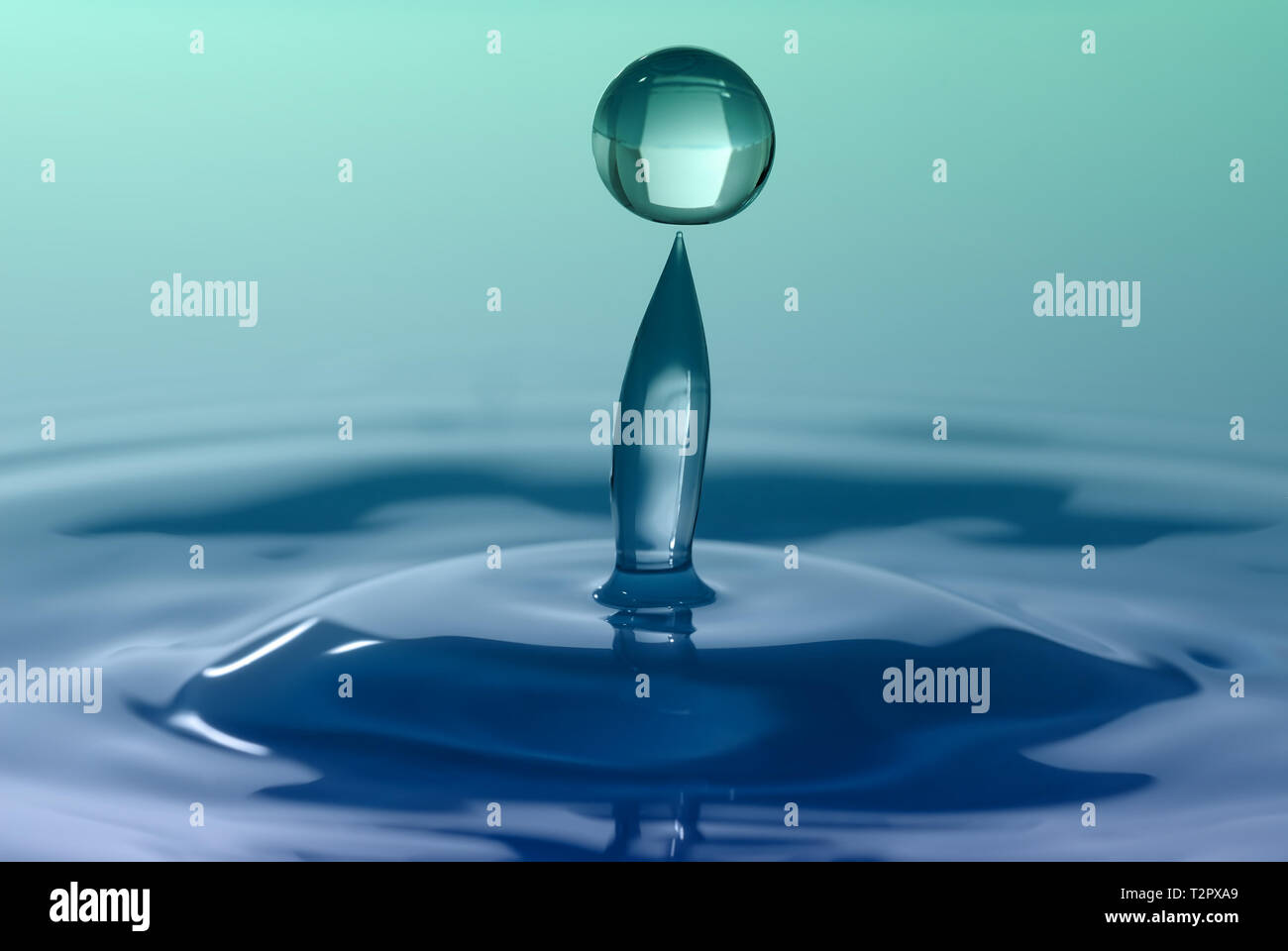 Closeup on water splash. Falling drop of water Stock Photo - Alamy