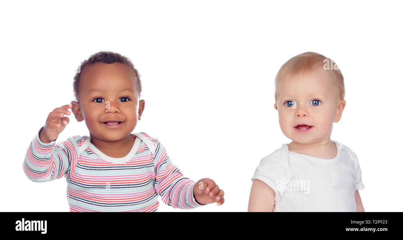 Two happy babies of different races isolated on a white background ...