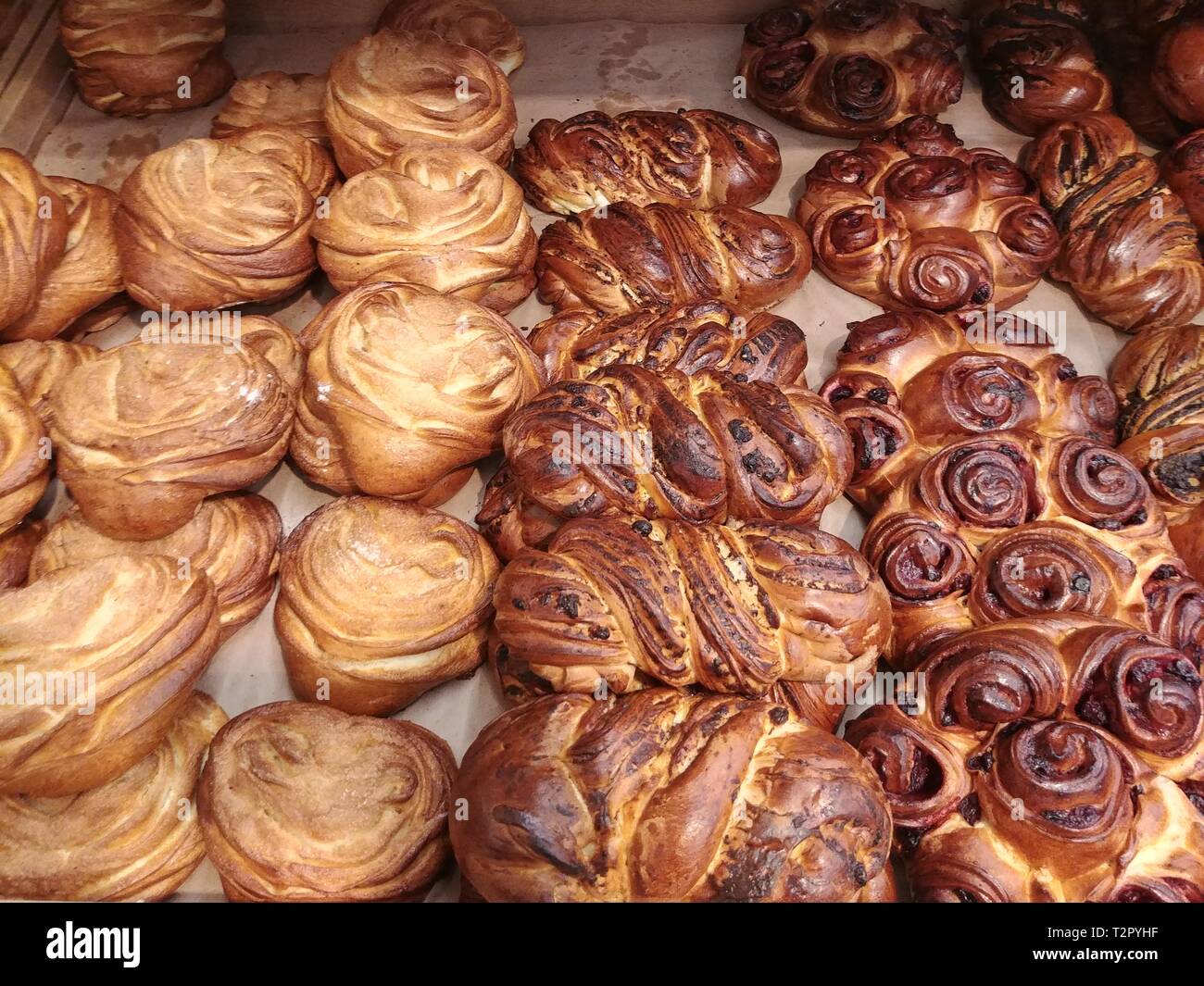 some fancy braided bread at bakery store shop, freashly baked cakes ...
