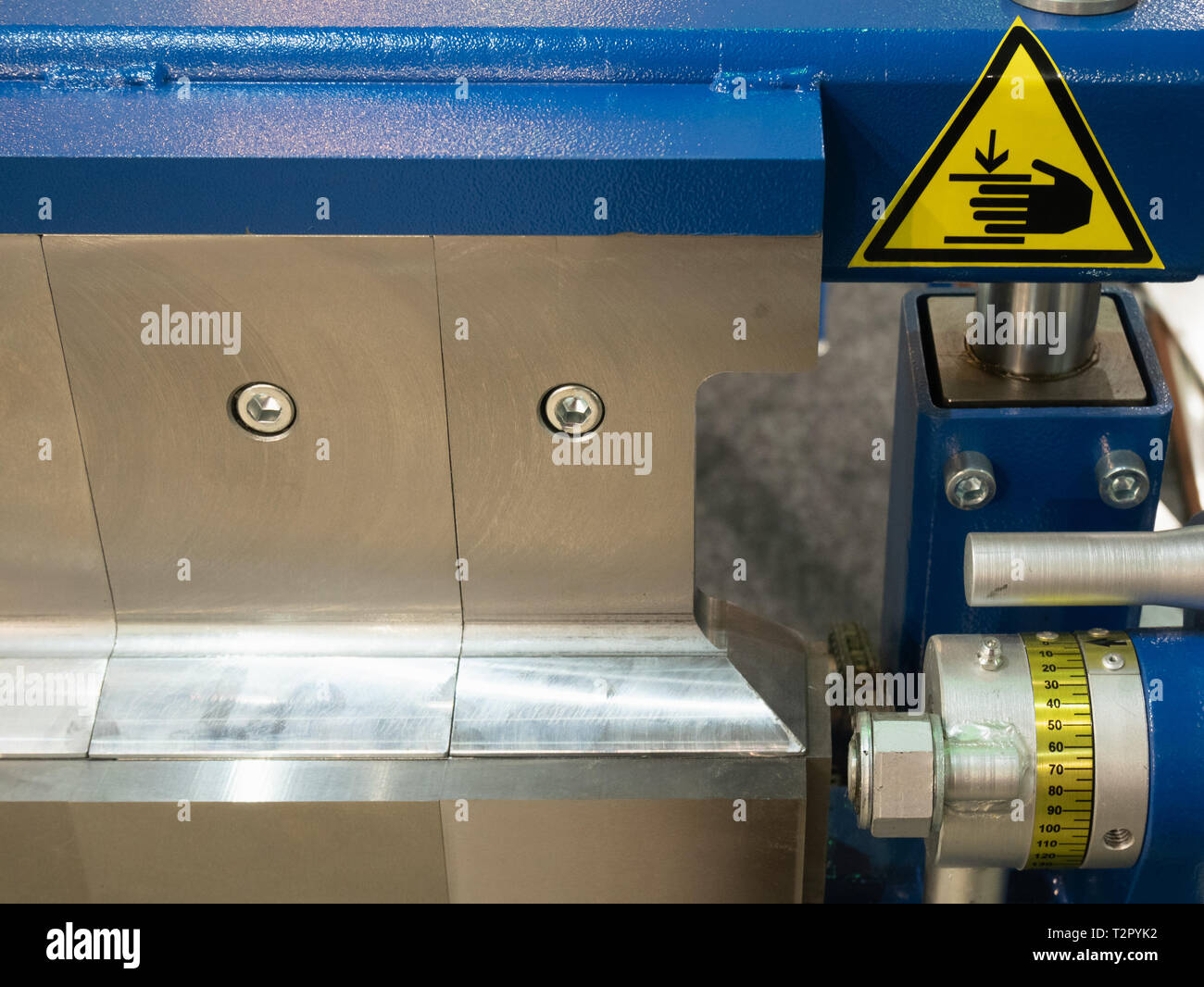 closeup of pressing stamping hydraulic pressure automatic machine ...