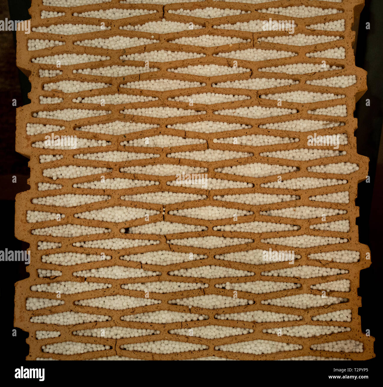 sample of red building hollow brick full of Styrofoam, foam plastic ...