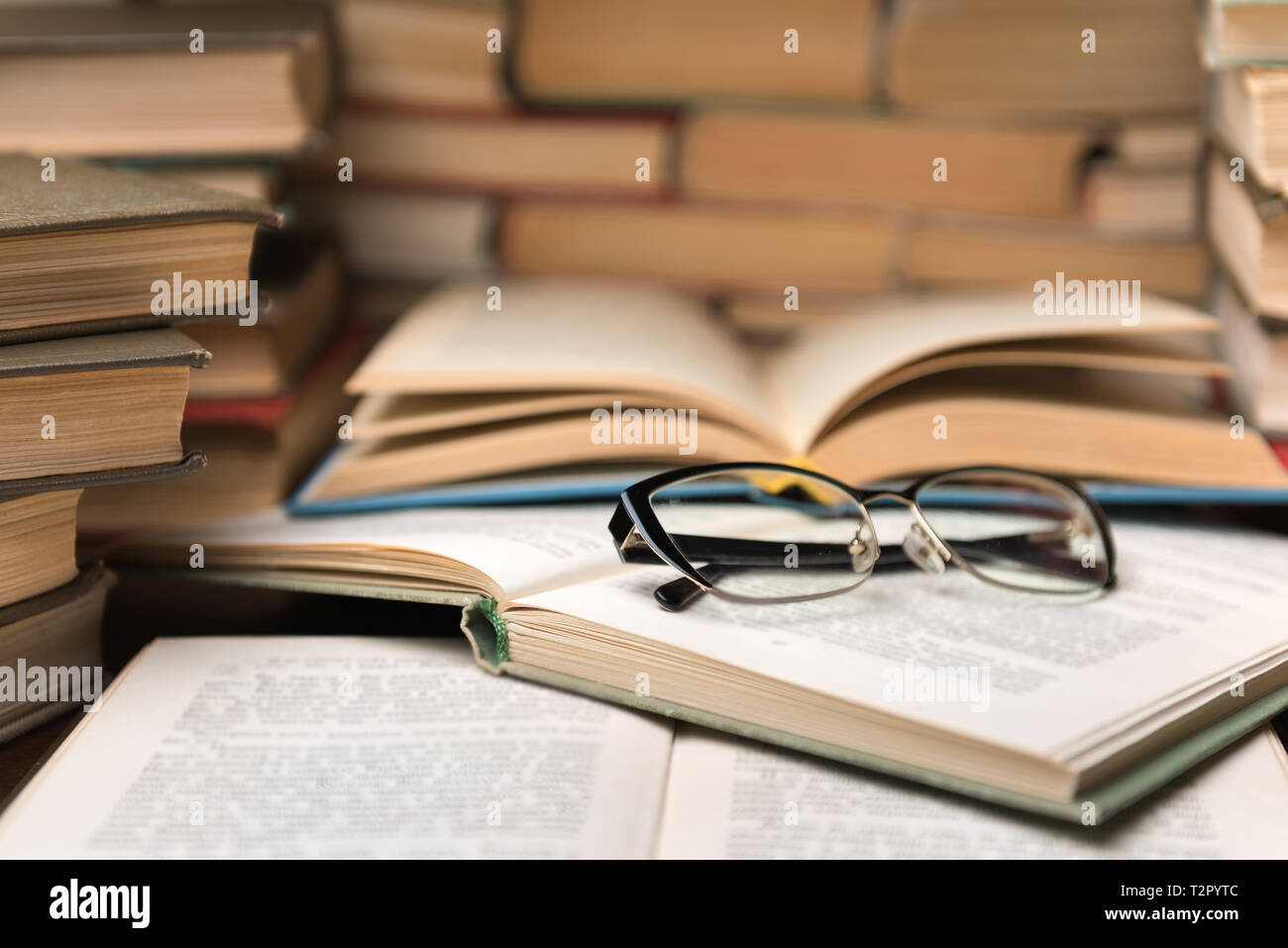 Old open books in library, stack piles of literature text archive on ...