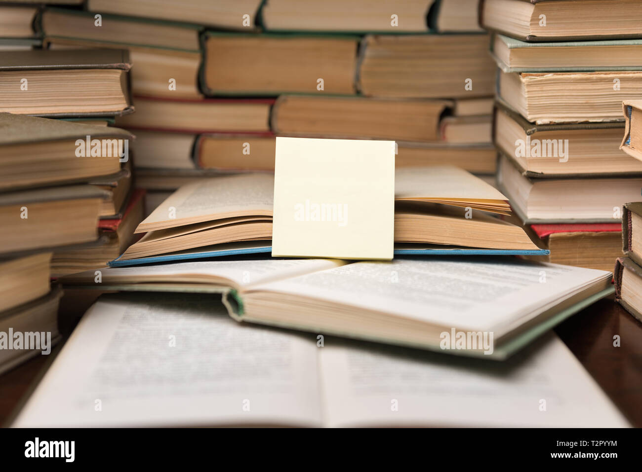 Education learning concept with open book and notebook on the table ...