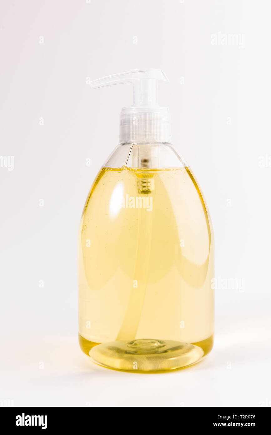 yellow liquid soap isolated on a white background Stock Photo - Alamy