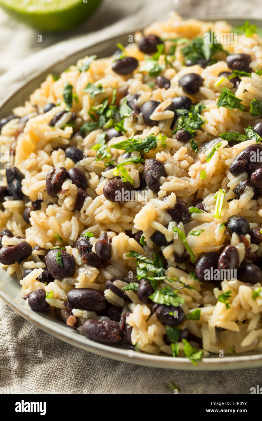 Homemade Mexican Black Beans and Rice with Cilantro Stock Photo - Alamy