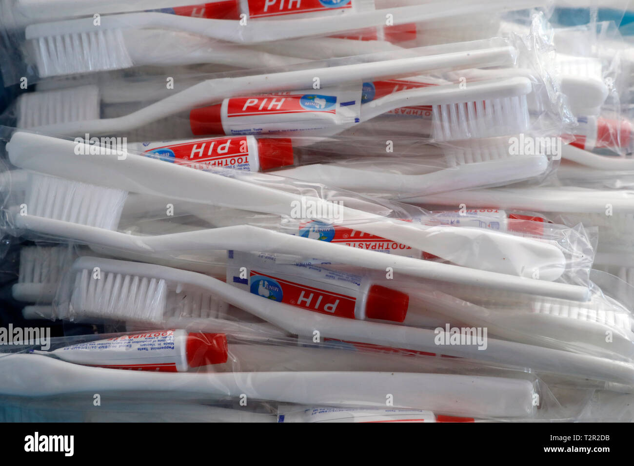 Close-Up Of White Plastic Toothbrushes Stock Photo - Alamy