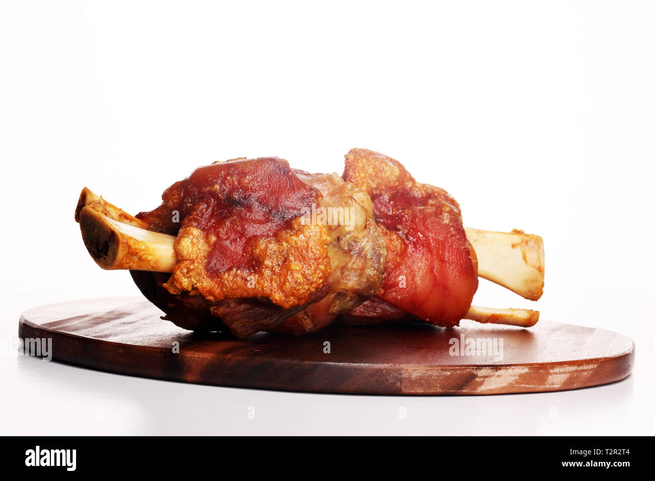 Roasted pork knuckle. Ham and bacon are popular foods in the west ...
