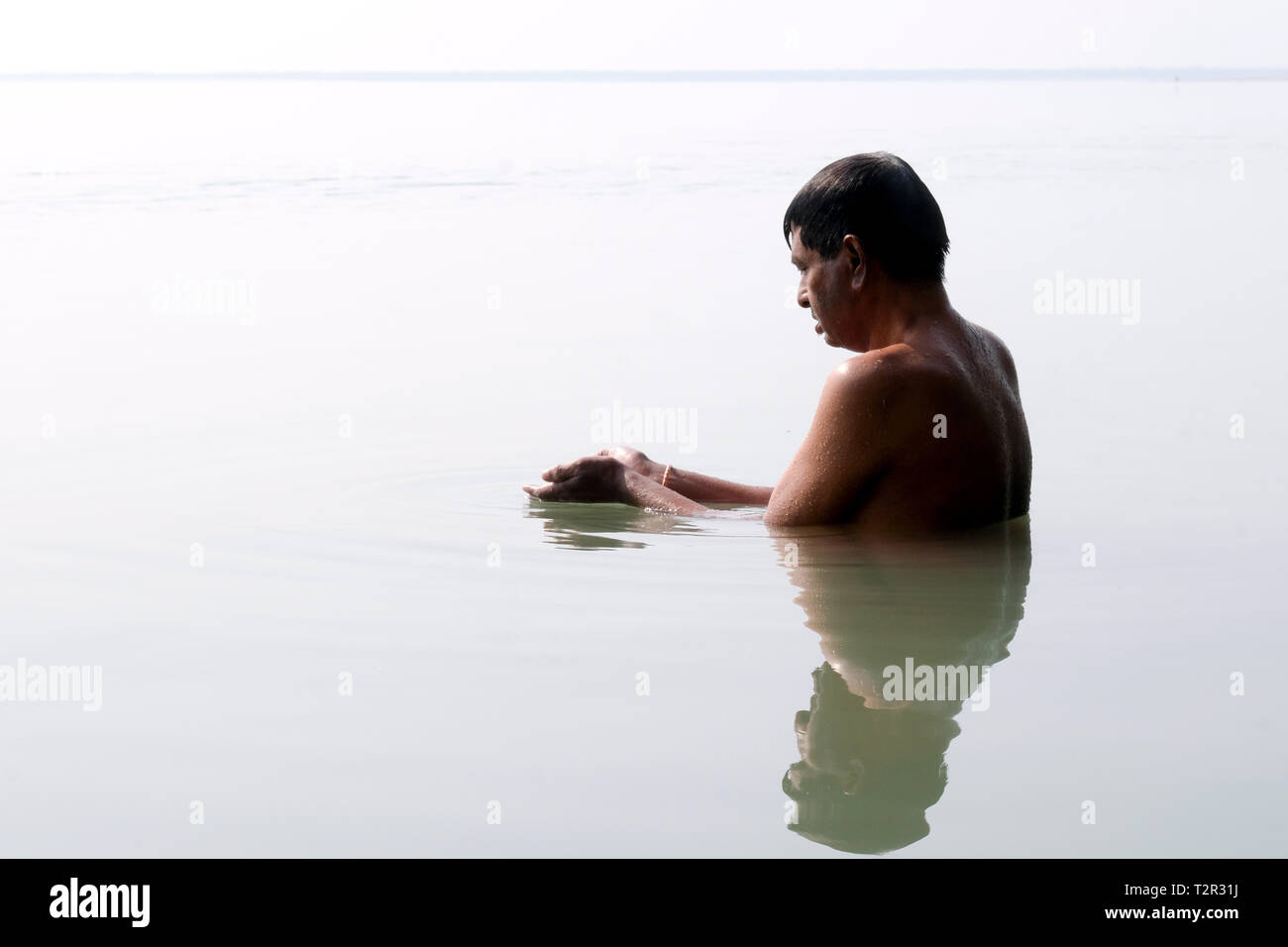 Ritual bath in Brahmaputra river in Tezpur, Assam state, India ...