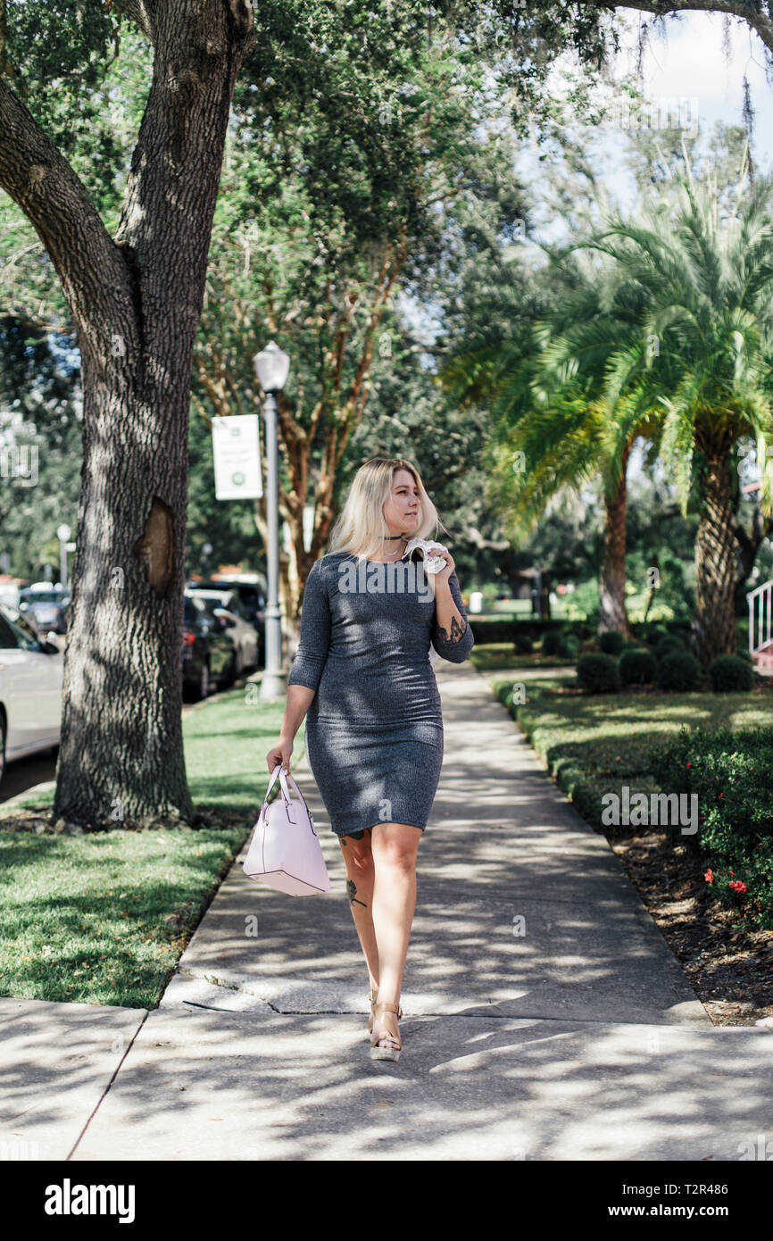 Walking in neighborhood hi-res stock photography and images - Alamy