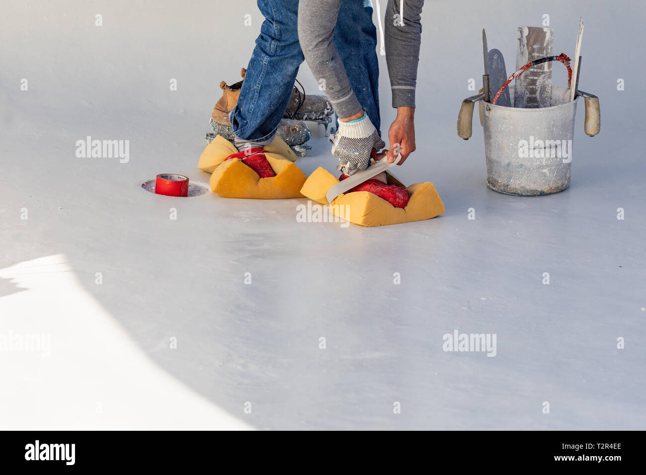 Construction worker applying plaster on hi-res stock photography and ...