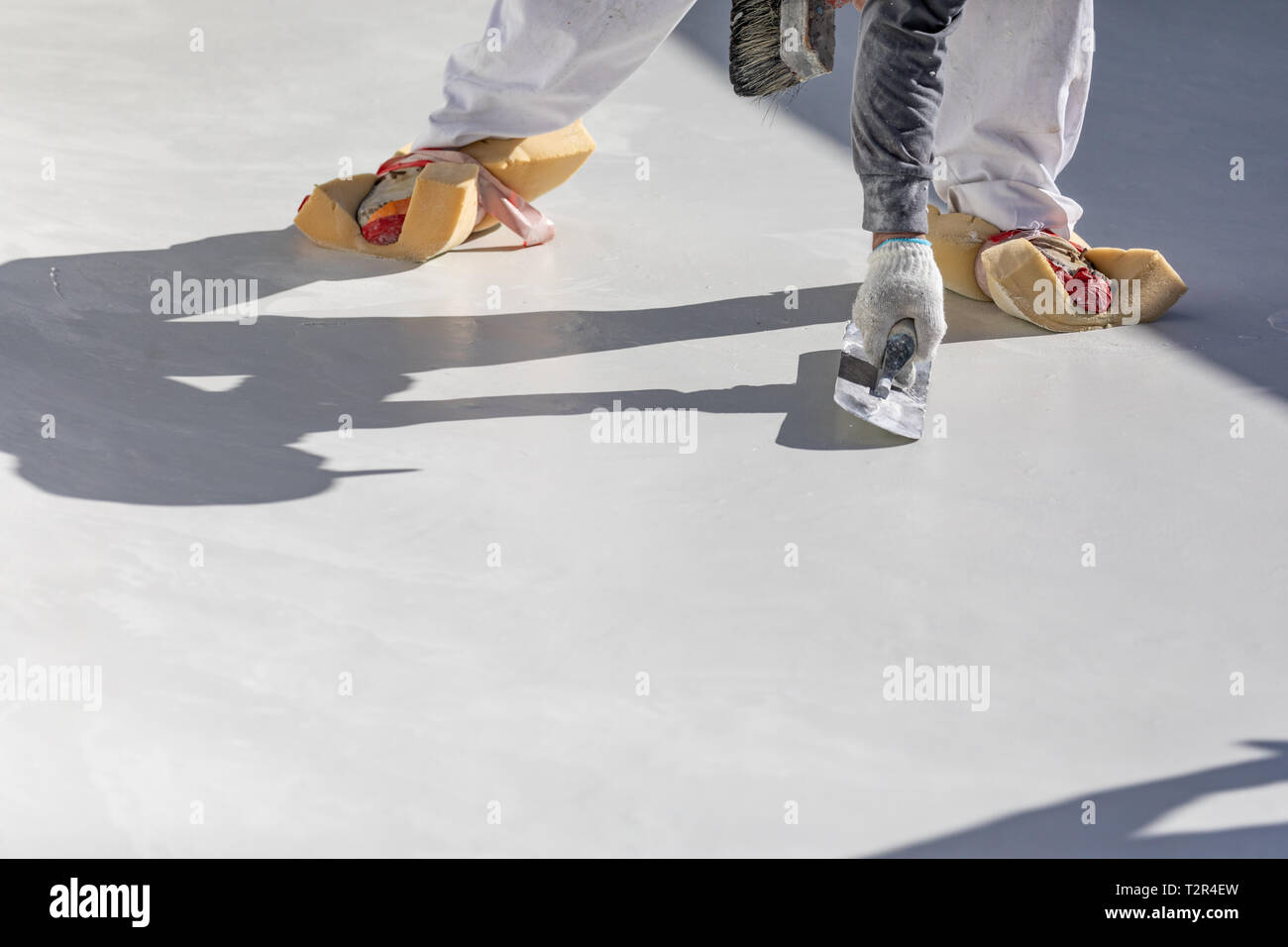 Worker applying plaster on hi-res stock photography and images - Alamy