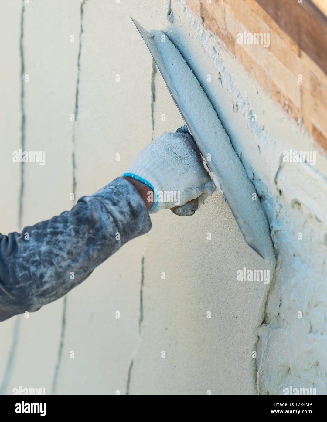 Worker Smoothing Wet Pool Plaster With Trowel Stock Photo - Alamy