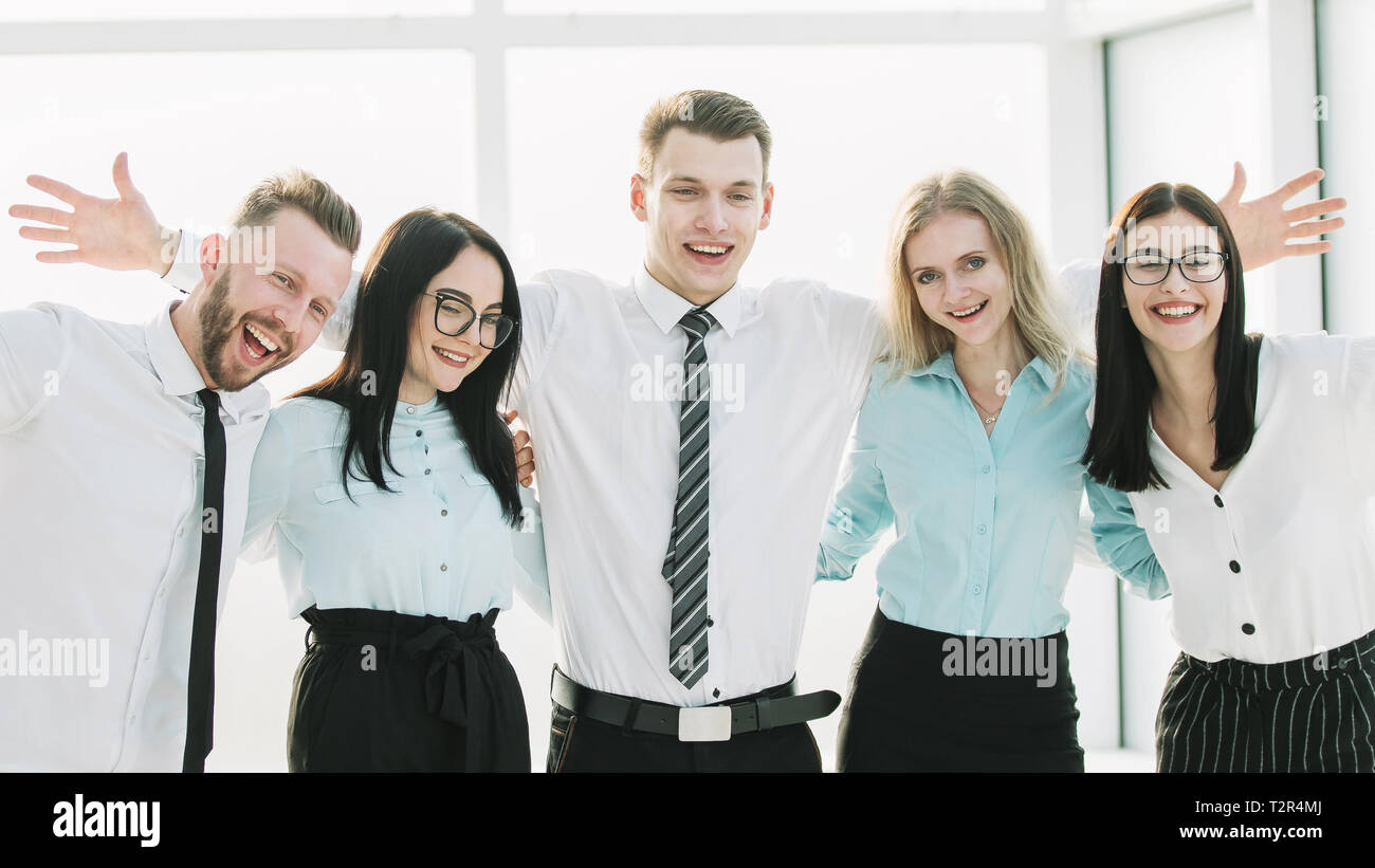 successful business team standing near the office window. the concept ...