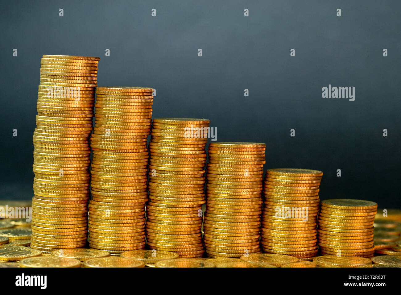 Descending coin hi-res stock photography and images - Alamy