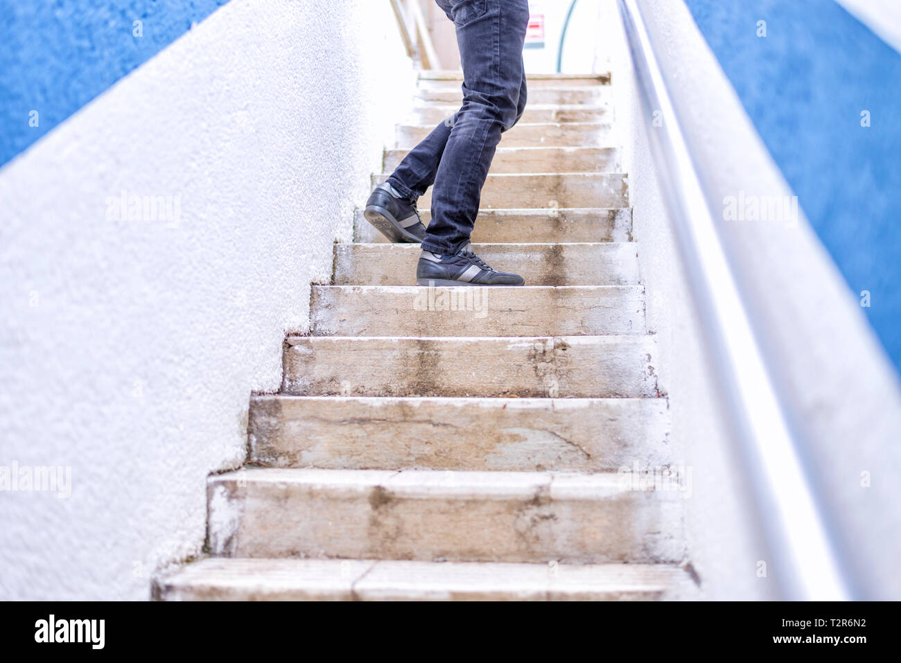 Man moving up stairs hi-res stock photography and images - Alamy